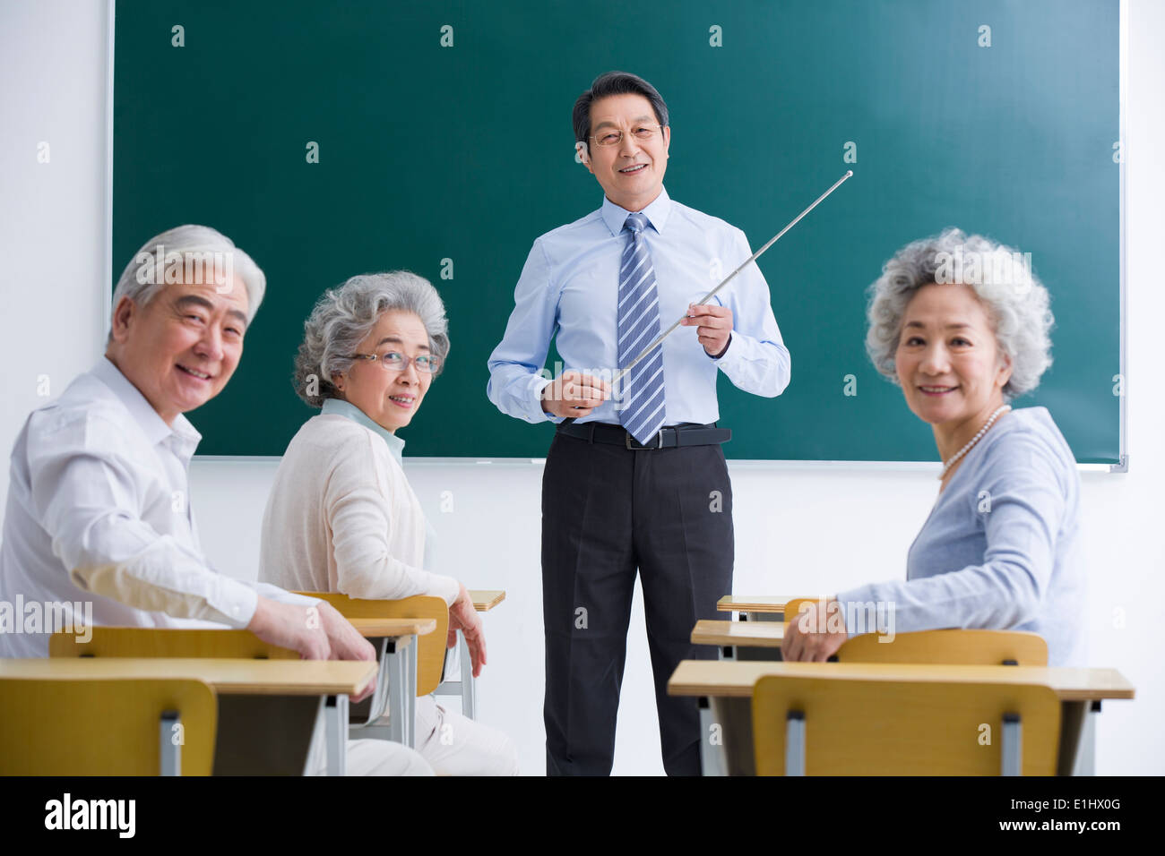 Senior adults having class at school Stock Photo - Alamy