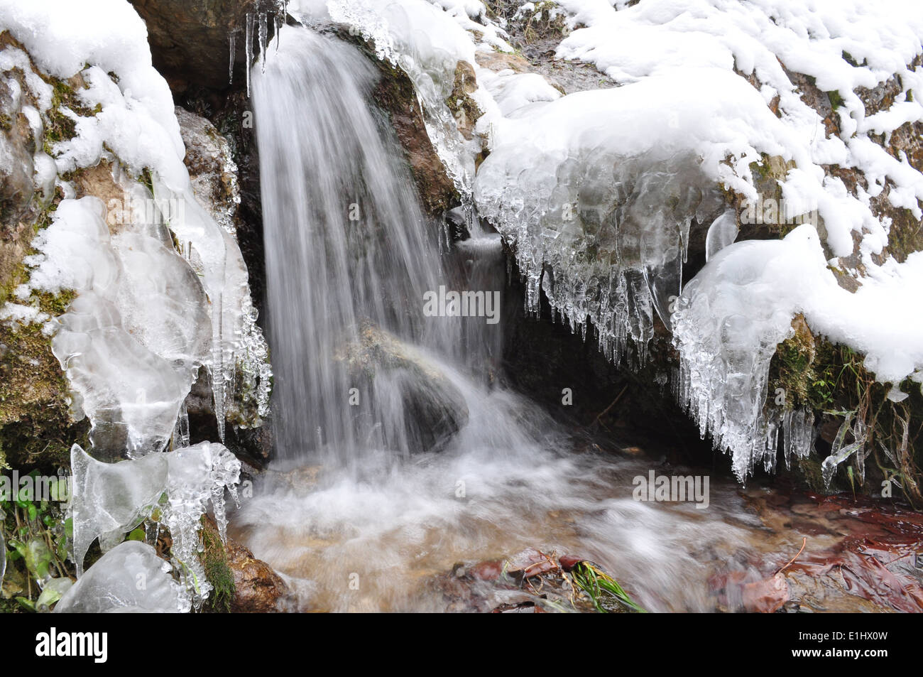 Waterfall and needle ice Stock Photo - Alamy