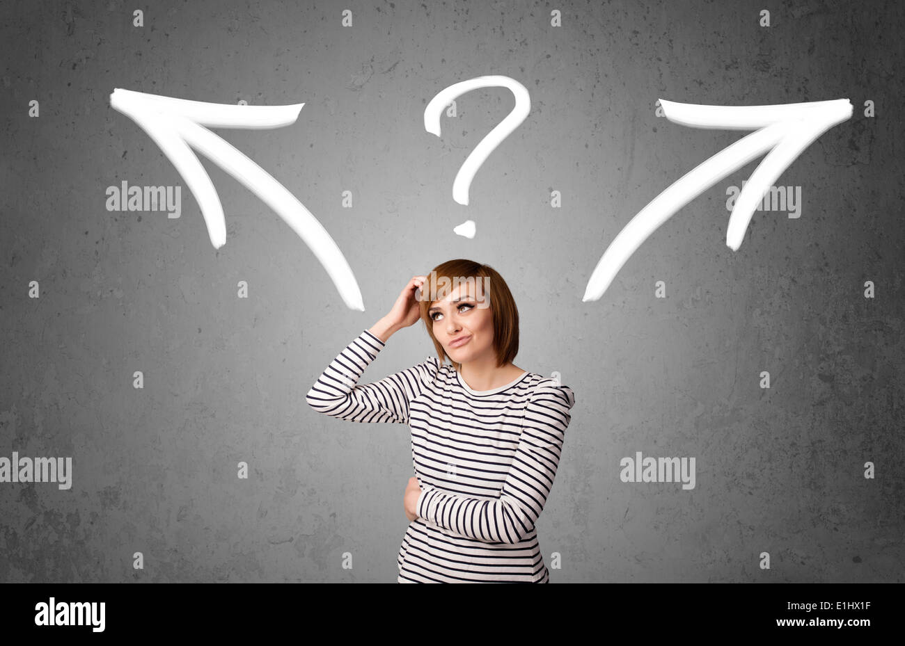 Young woman taking a decision Stock Photo - Alamy