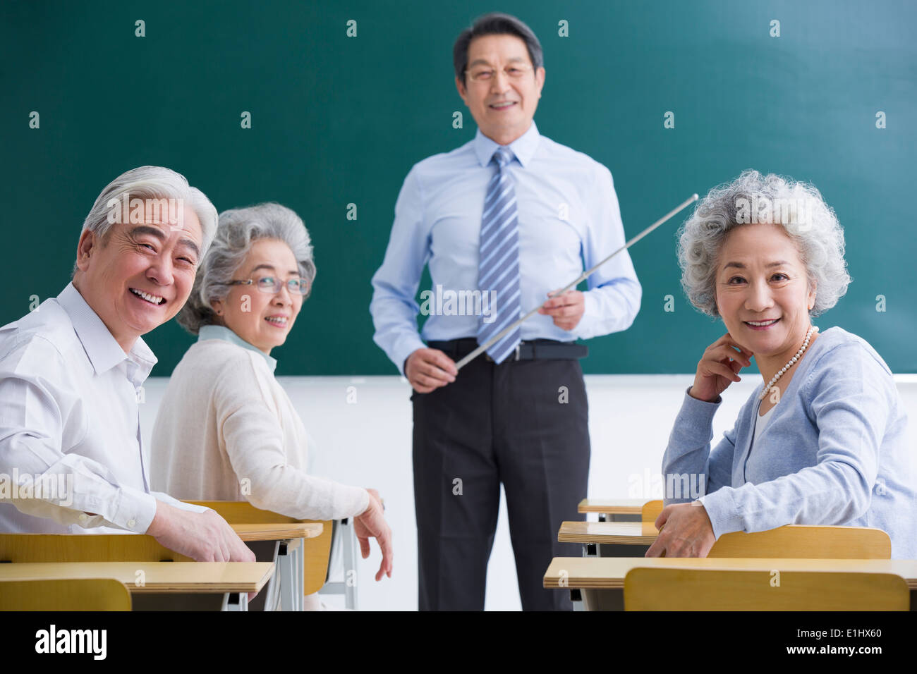Senior adults having class at school Stock Photo - Alamy