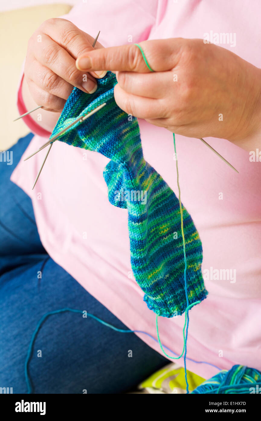 Germany, Mid-adult woman knitting socks Stock Photo - Alamy