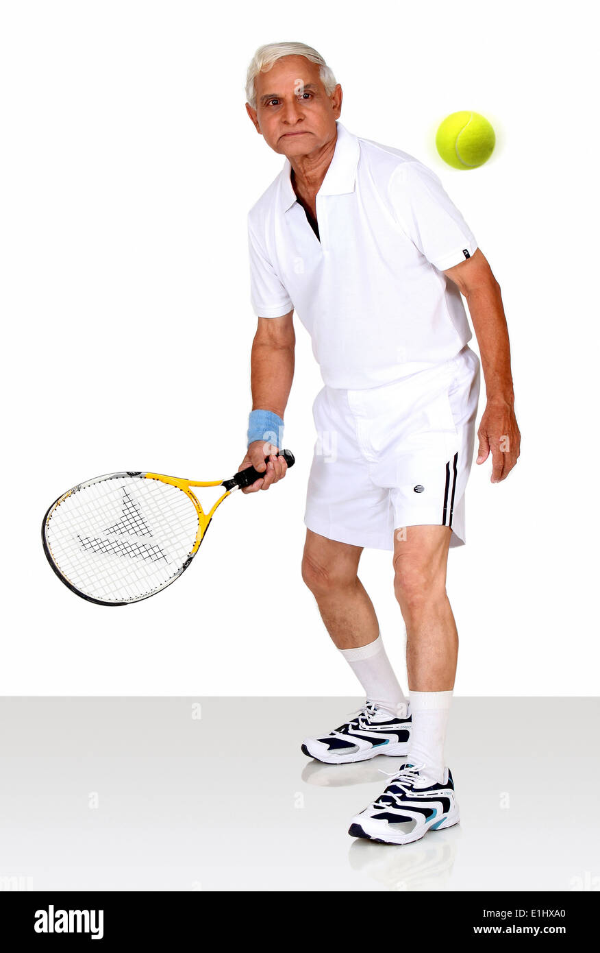 A sports person playing lawn tennis, Pune, India Stock Photo - Alamy