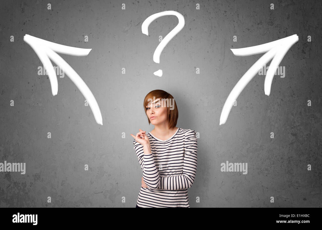 Young woman taking a decision Stock Photo - Alamy