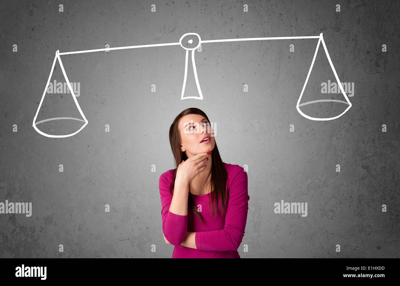 Young woman taking a decision Stock Photo - Alamy