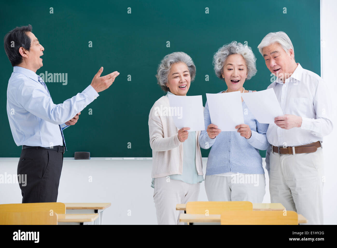 Senior adults having music class at school Stock Photo - Alamy
