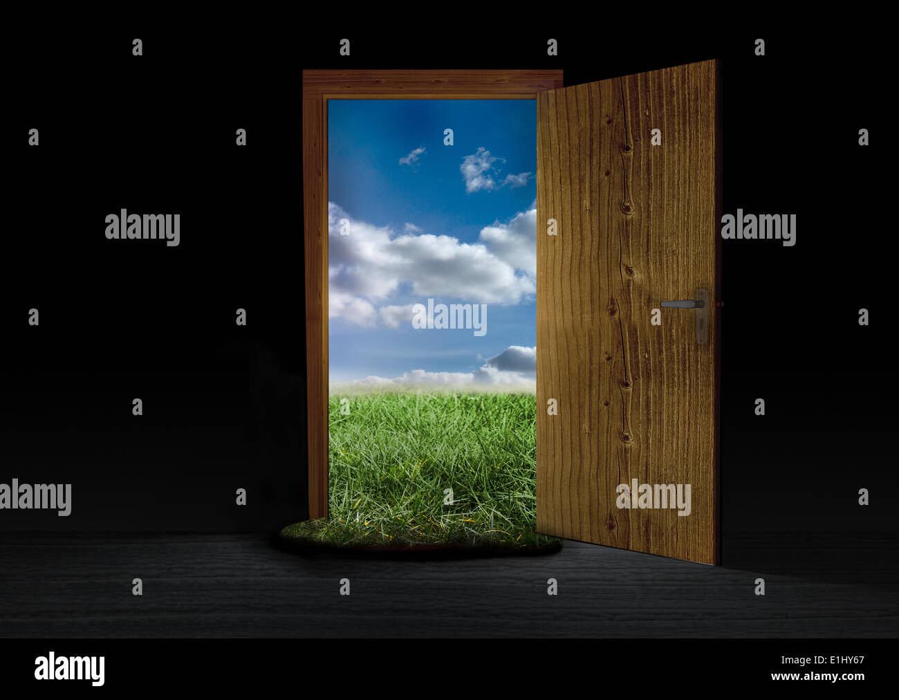 Opened door showing landscape of countryside Stock Photo - Alamy