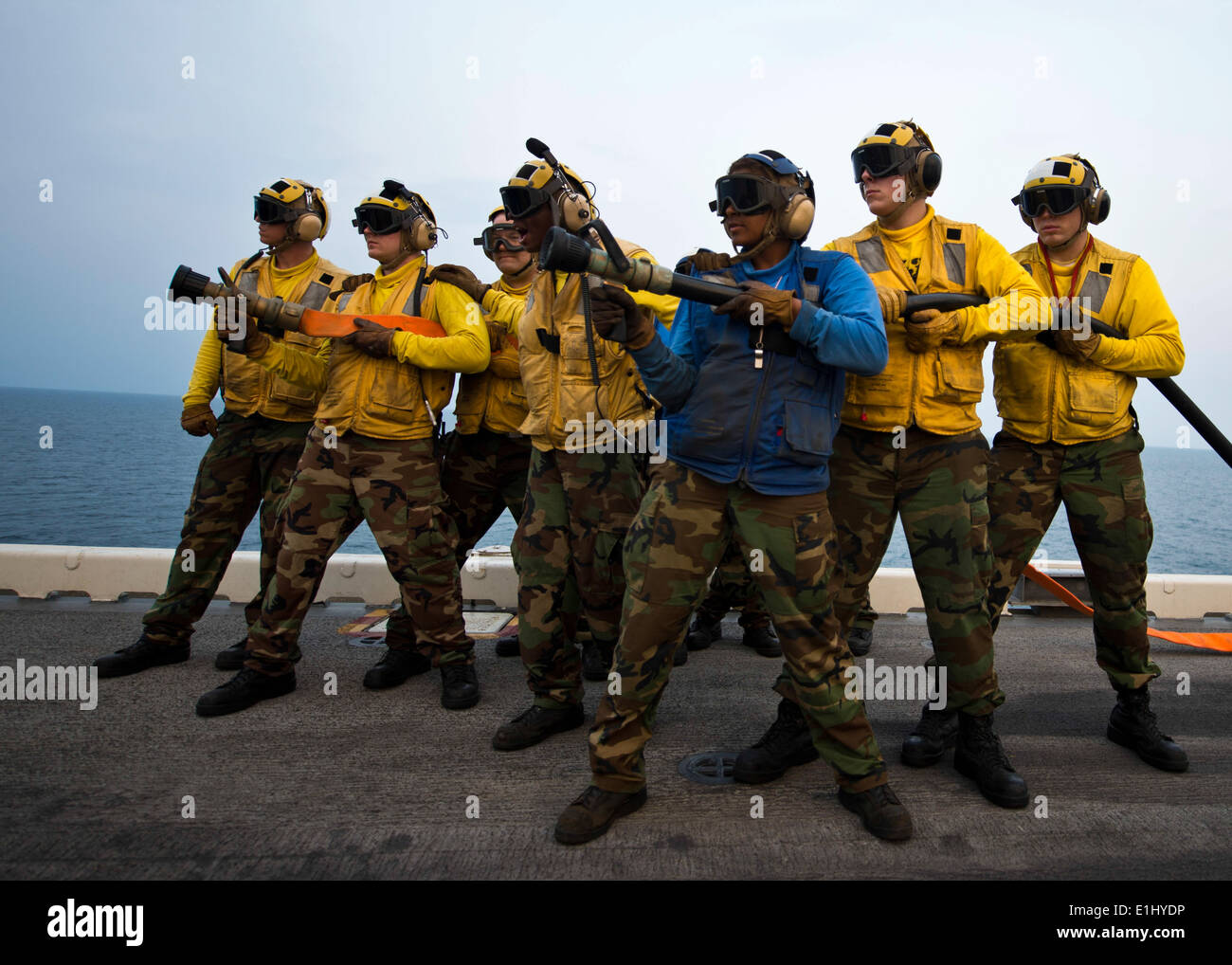 Navy fire hose teams hi-res stock photography and images - Alamy