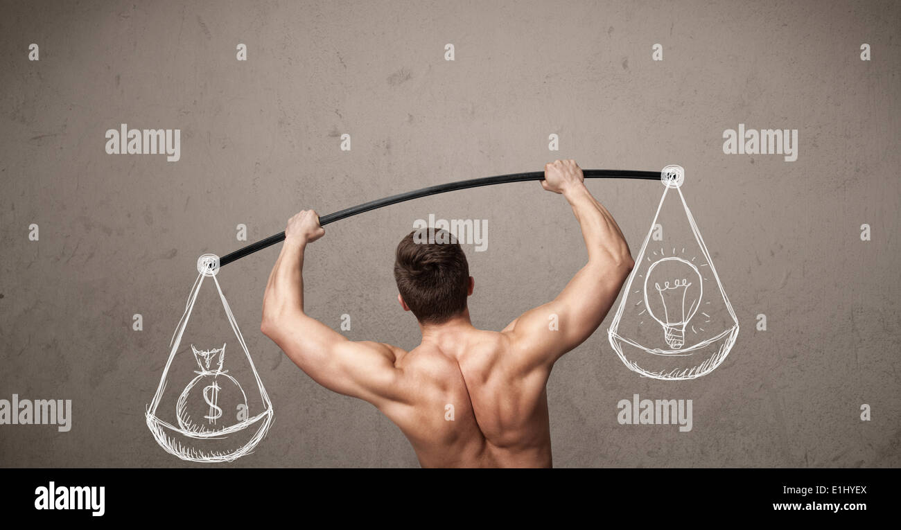 muscular man trying to get balanced Stock Photo - Alamy