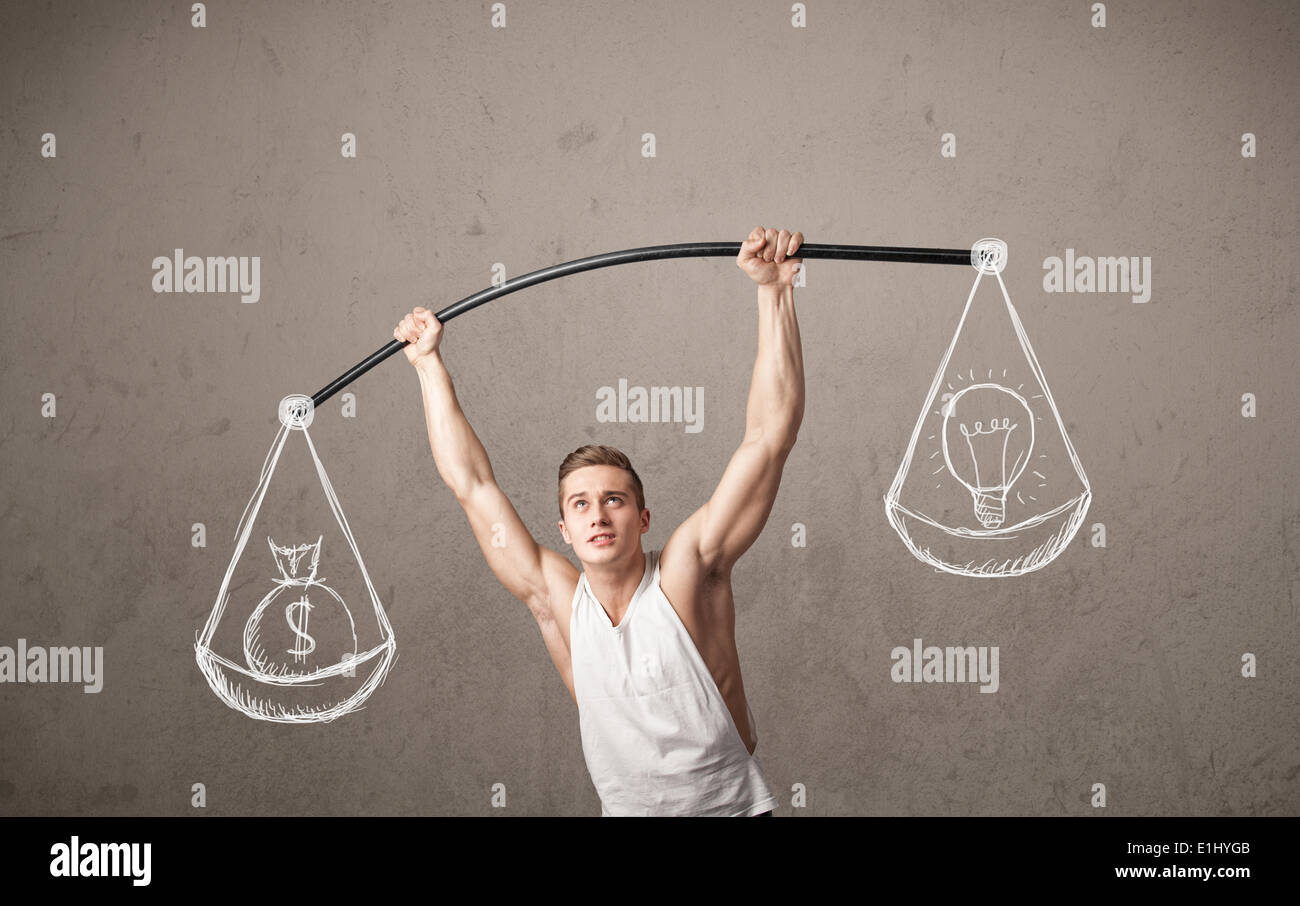 muscular man trying to get balanced Stock Photo - Alamy