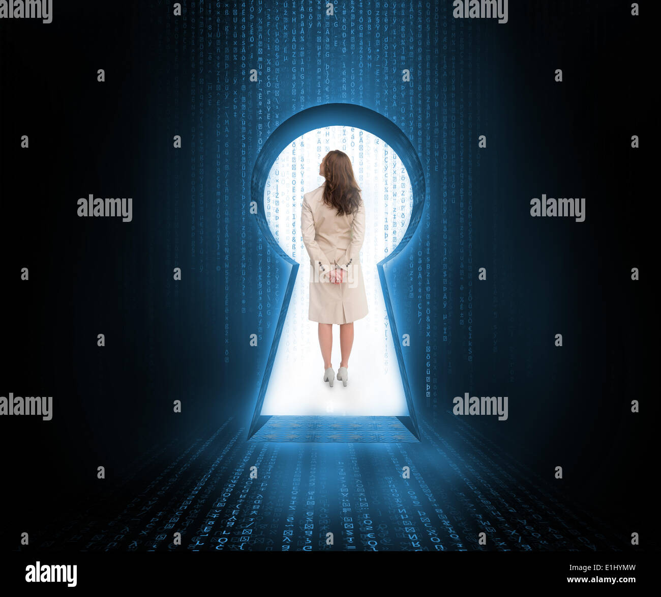 Businesswoman standing in keyhole doorway Stock Photo - Alamy