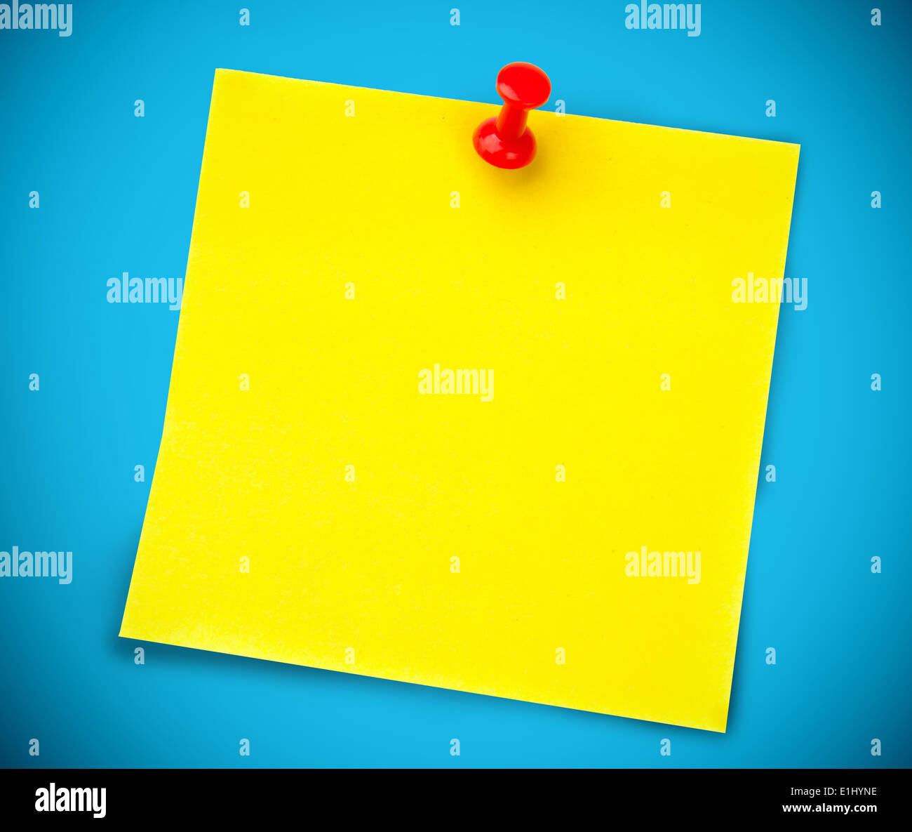 Yellow post it on the wall Stock Photo - Alamy