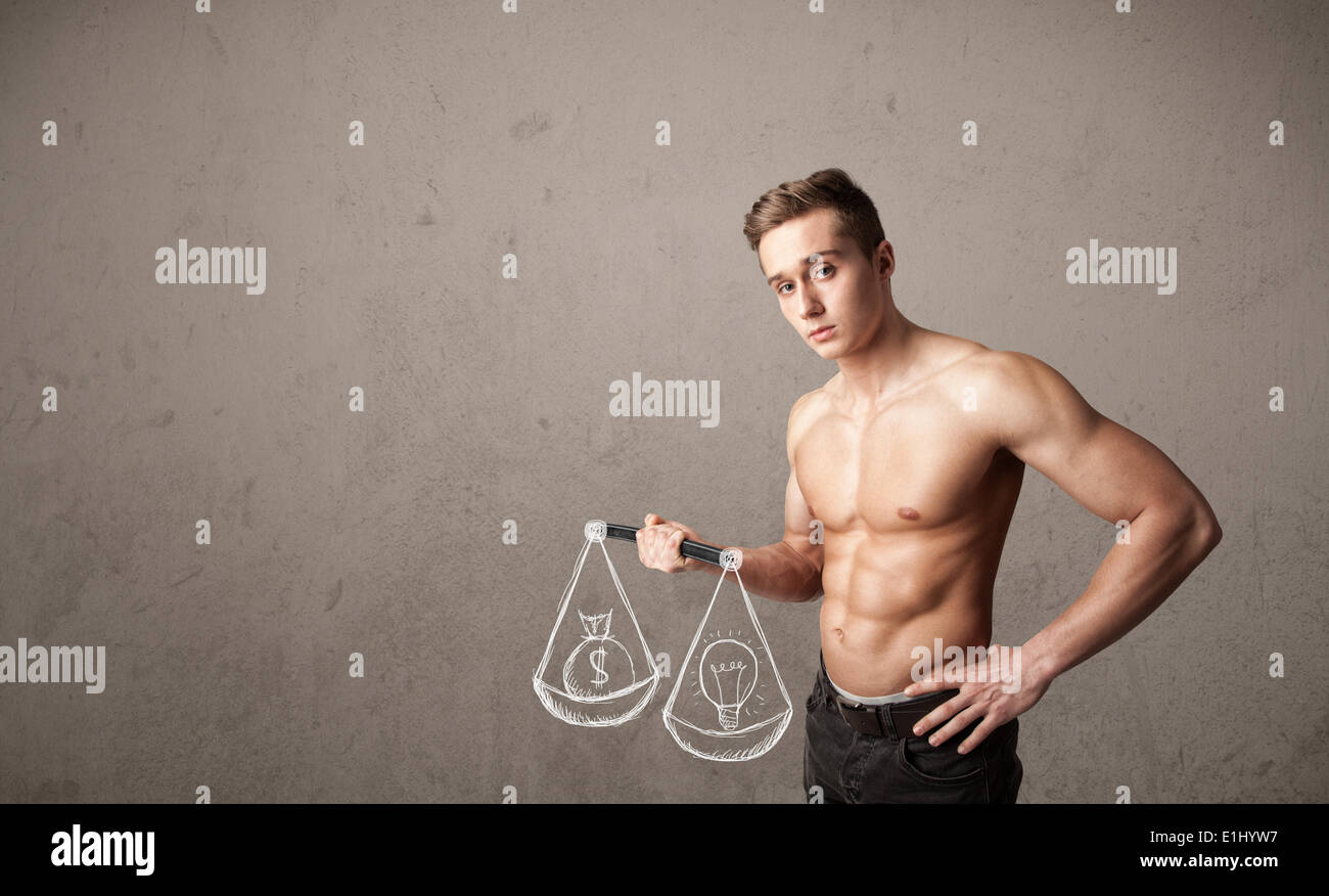 muscular man trying to get balanced Stock Photo - Alamy