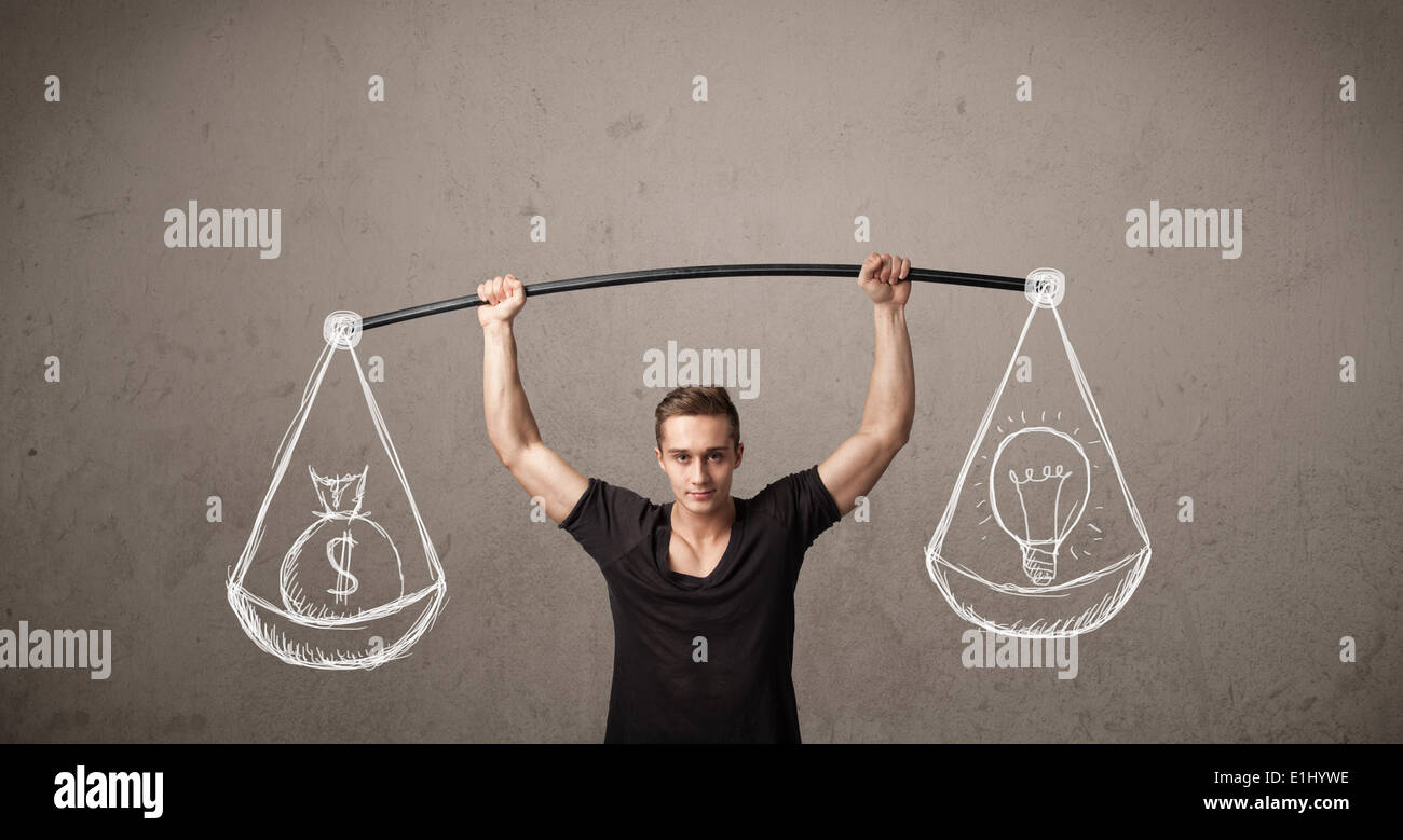muscular man trying to get balanced Stock Photo - Alamy