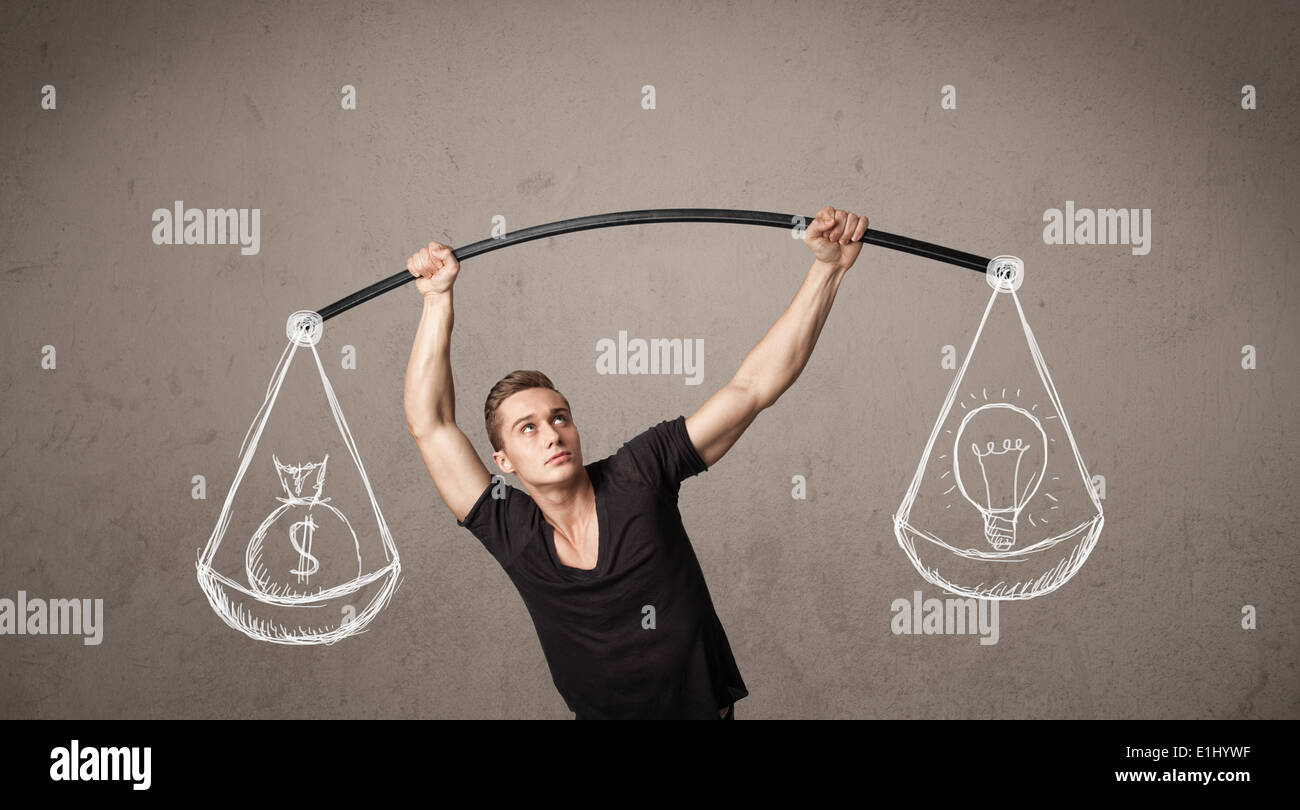 muscular man trying to get balanced Stock Photo - Alamy