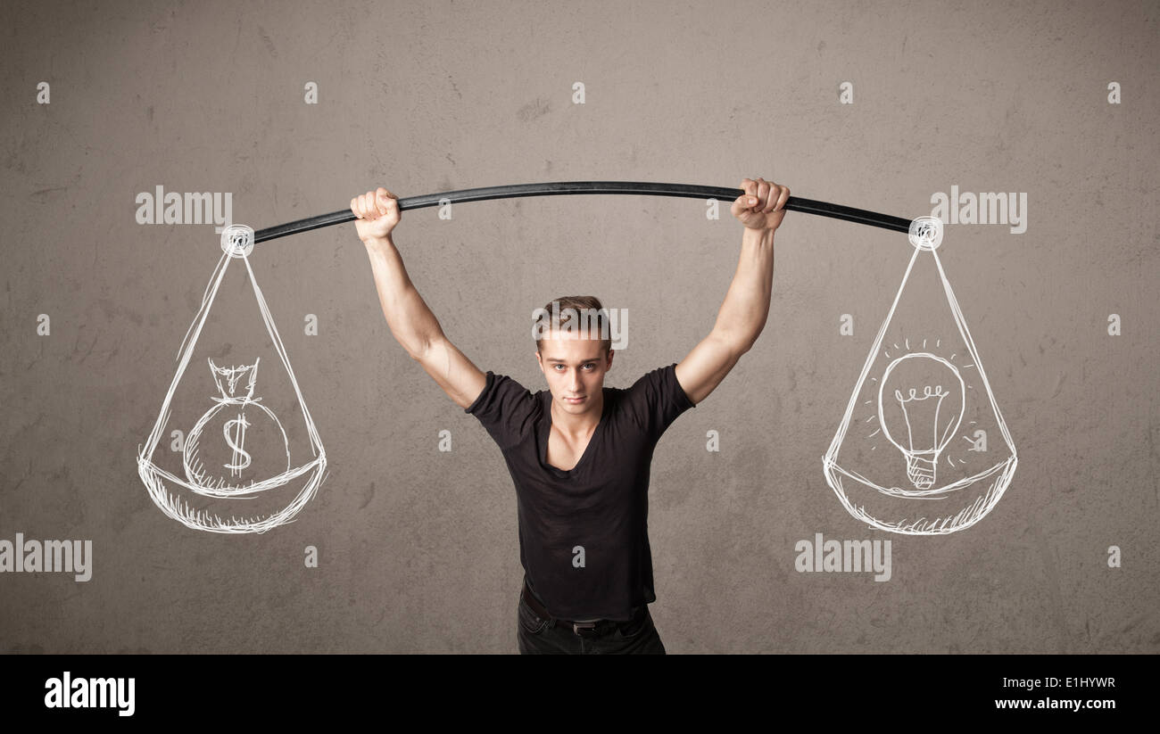 muscular man trying to get balanced Stock Photo - Alamy
