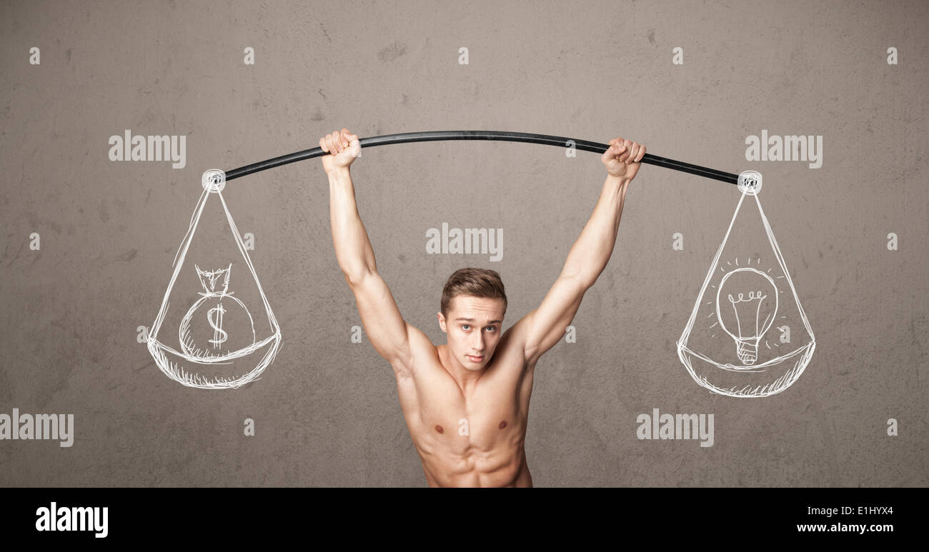muscular man trying to get balanced Stock Photo - Alamy