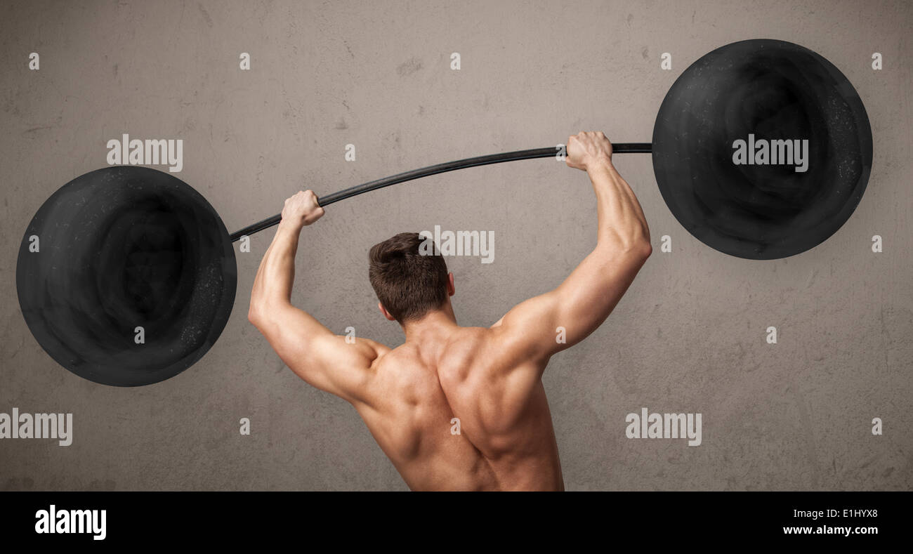 muscular man lifting weights Stock Photo - Alamy