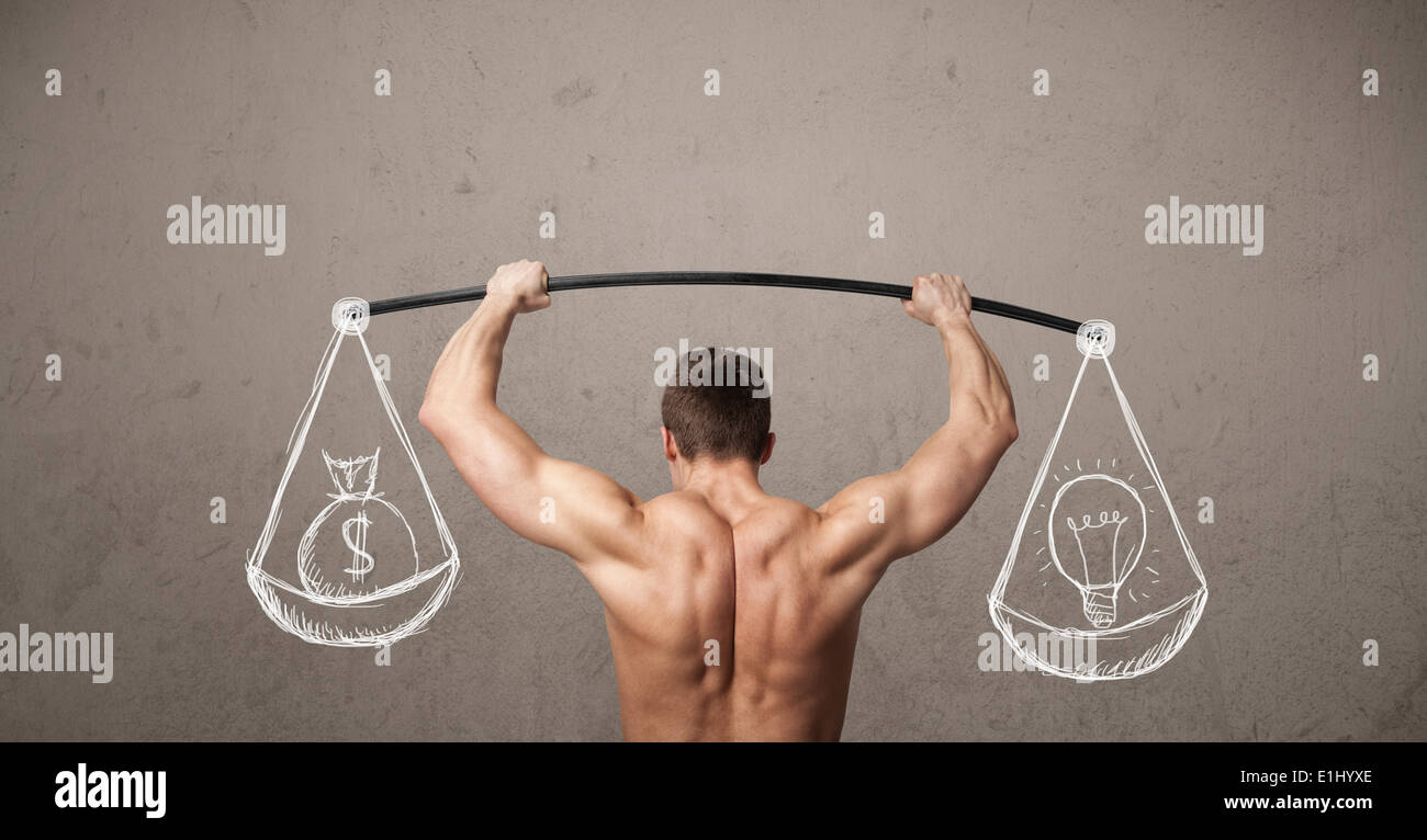 muscular man trying to get balanced Stock Photo - Alamy