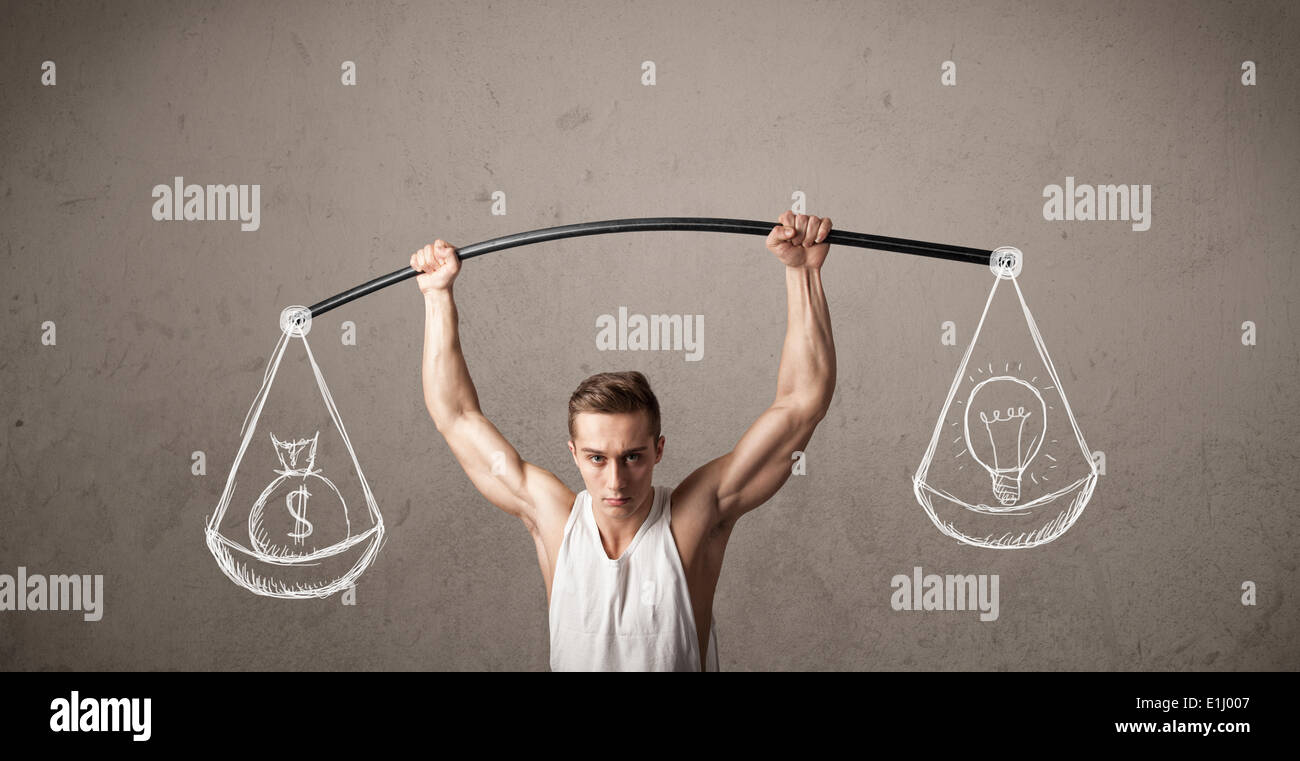 muscular man trying to get balanced Stock Photo - Alamy