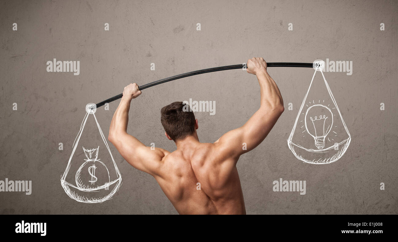 muscular man trying to get balanced Stock Photo - Alamy
