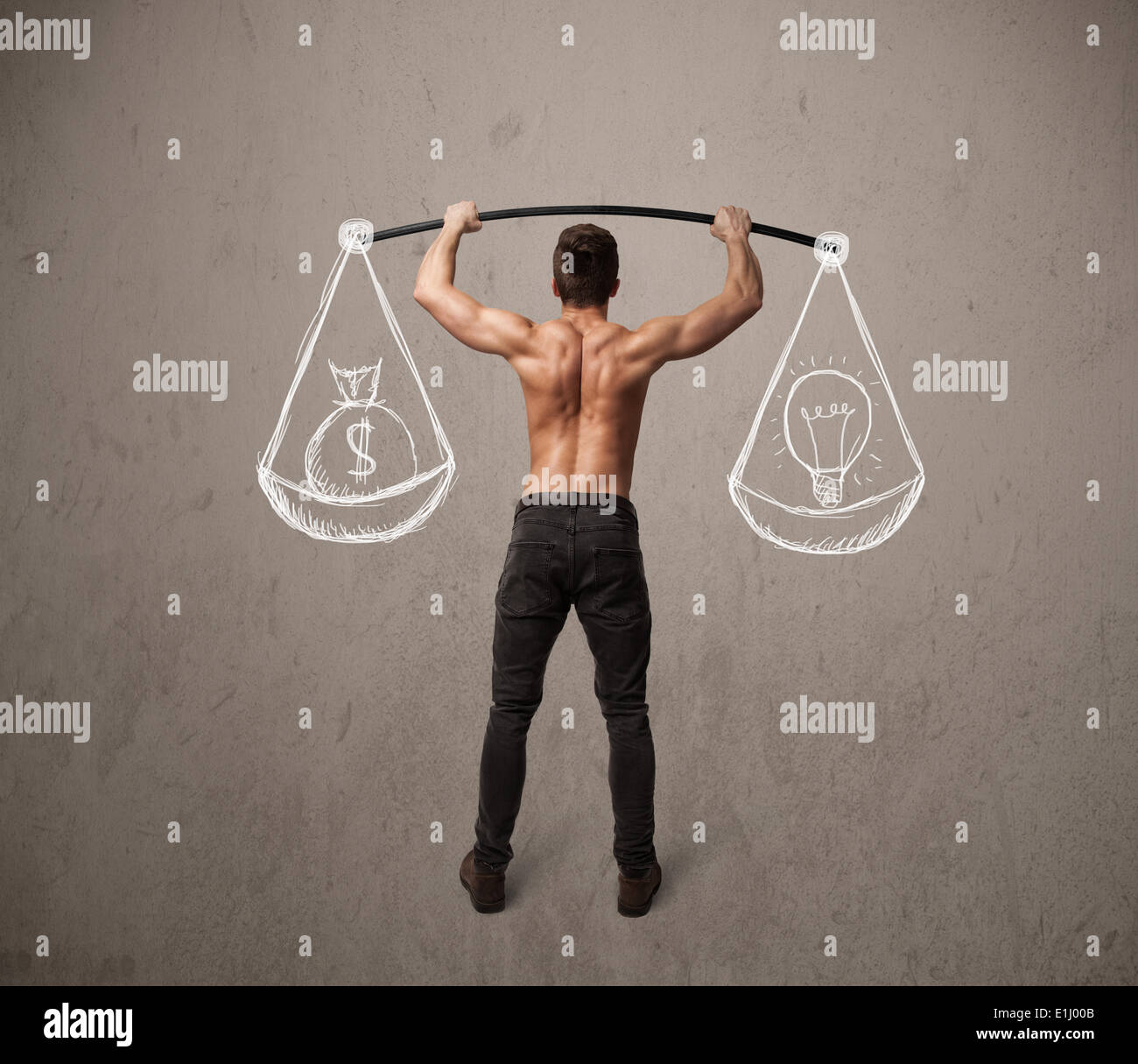 muscular man trying to get balanced Stock Photo - Alamy