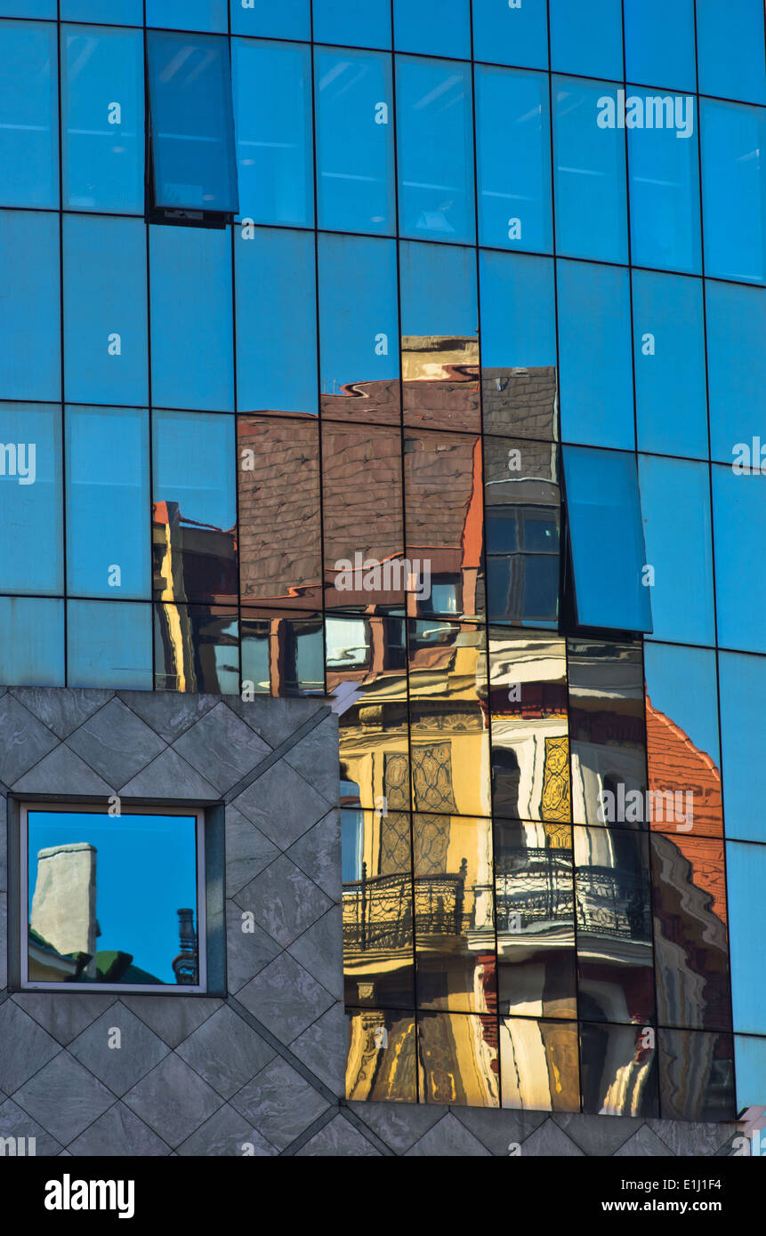 Abstract image as a reflection of old style buildings in a glass of ...