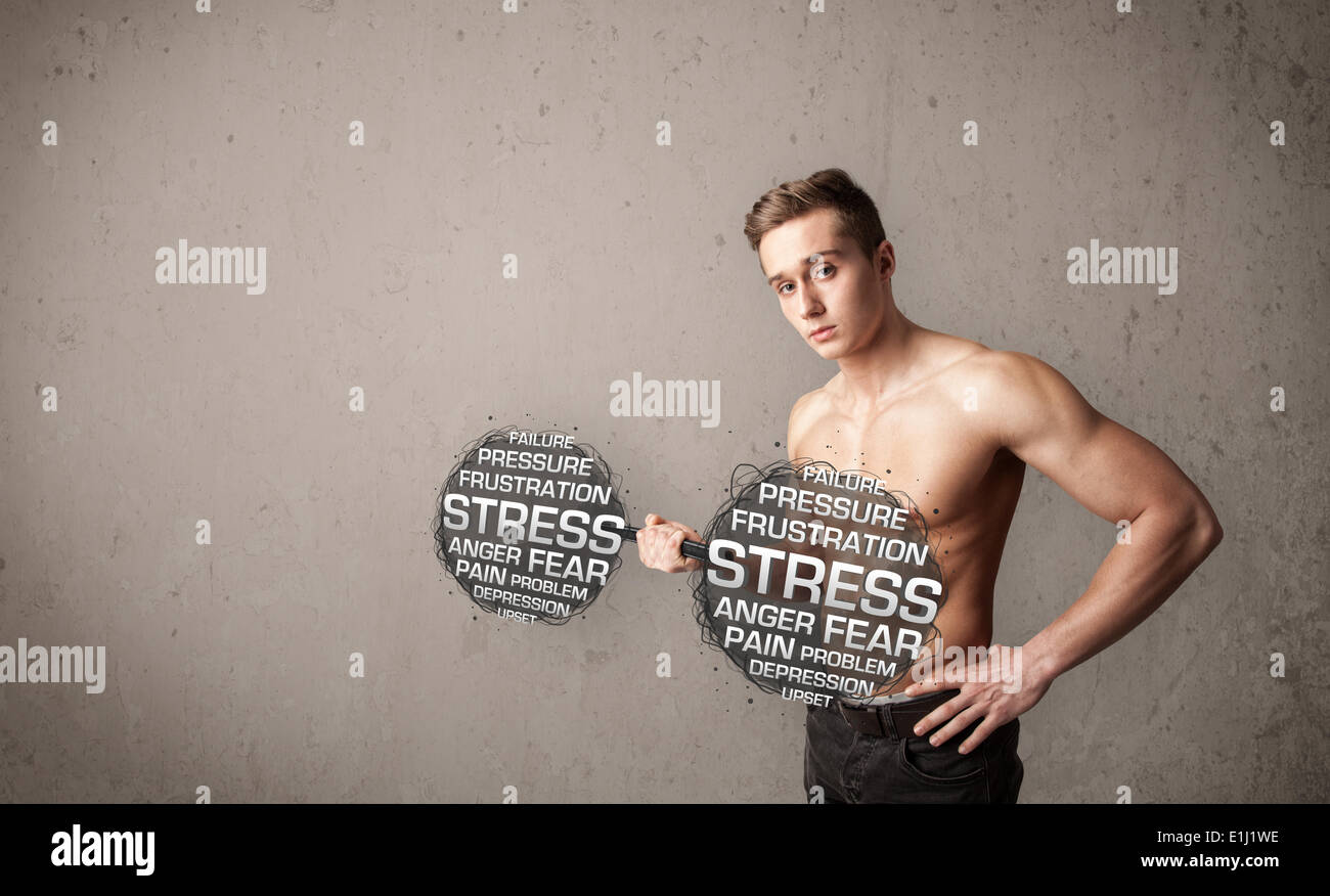 muscular man fighting with stress Stock Photo - Alamy