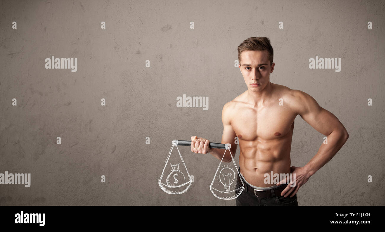 muscular man trying to get balanced Stock Photo - Alamy