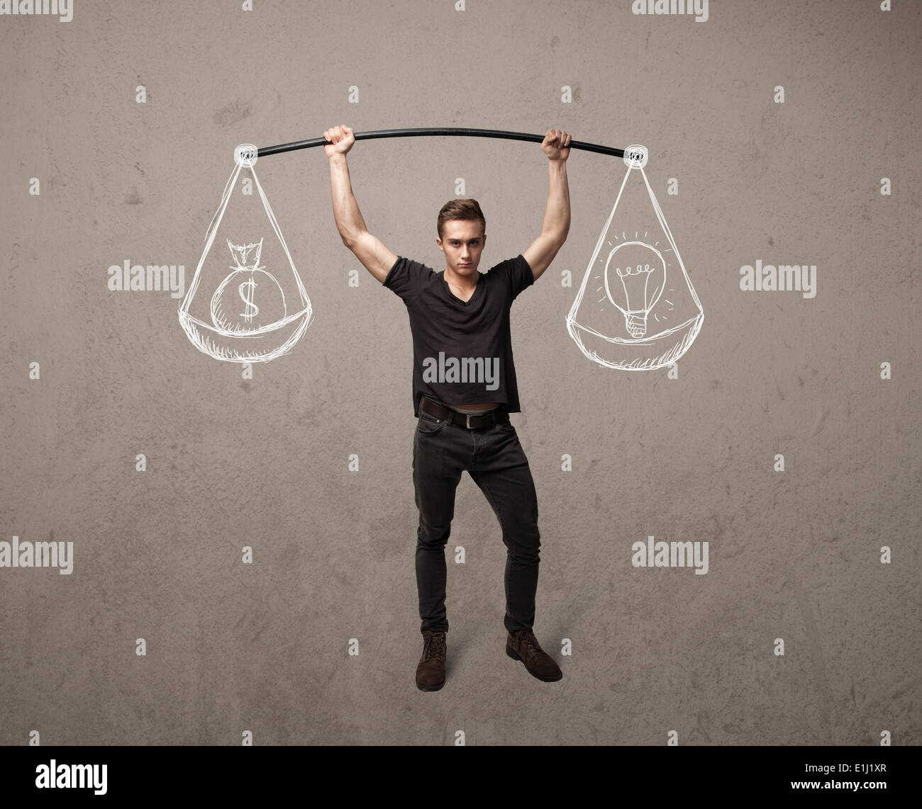 muscular man trying to get balanced Stock Photo - Alamy