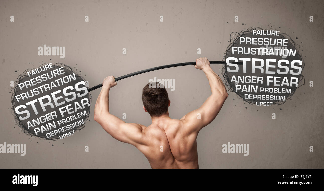 muscular man fighting with stress Stock Photo - Alamy