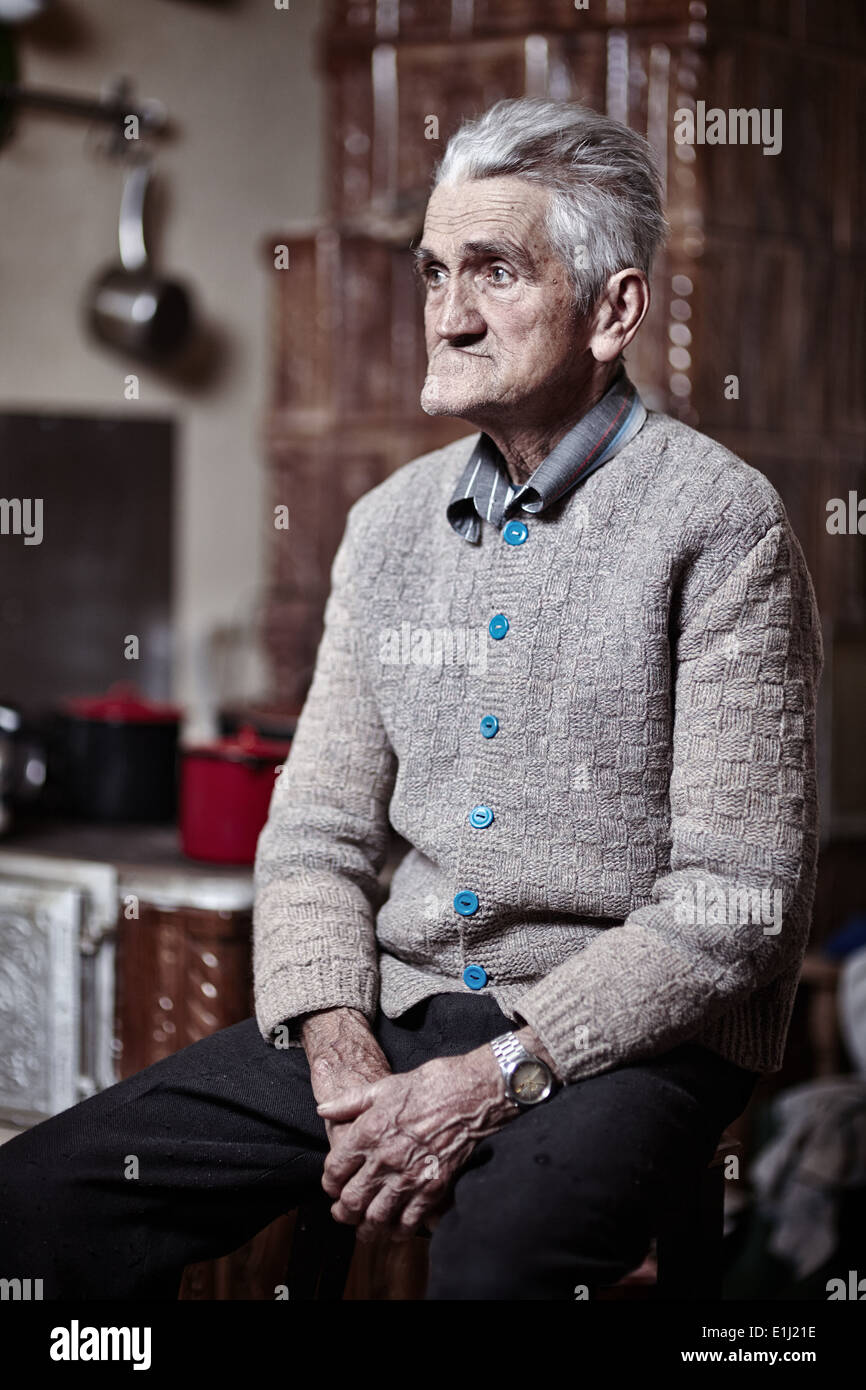 Portrait of a thoughtful old man indoor with selective focus Stock ...