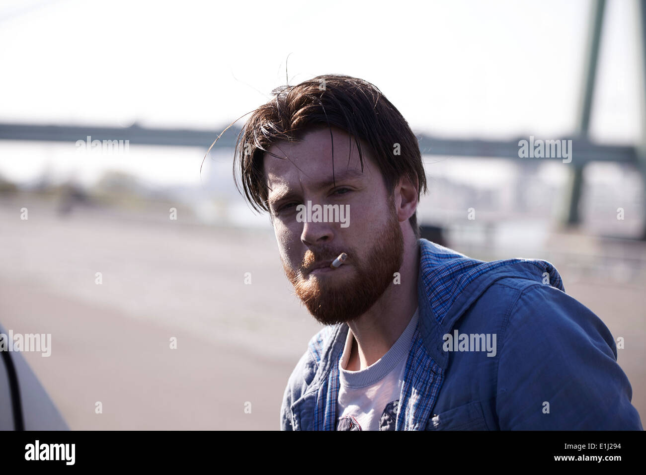 Portrait of man smoking hi-res stock photography and images - Alamy