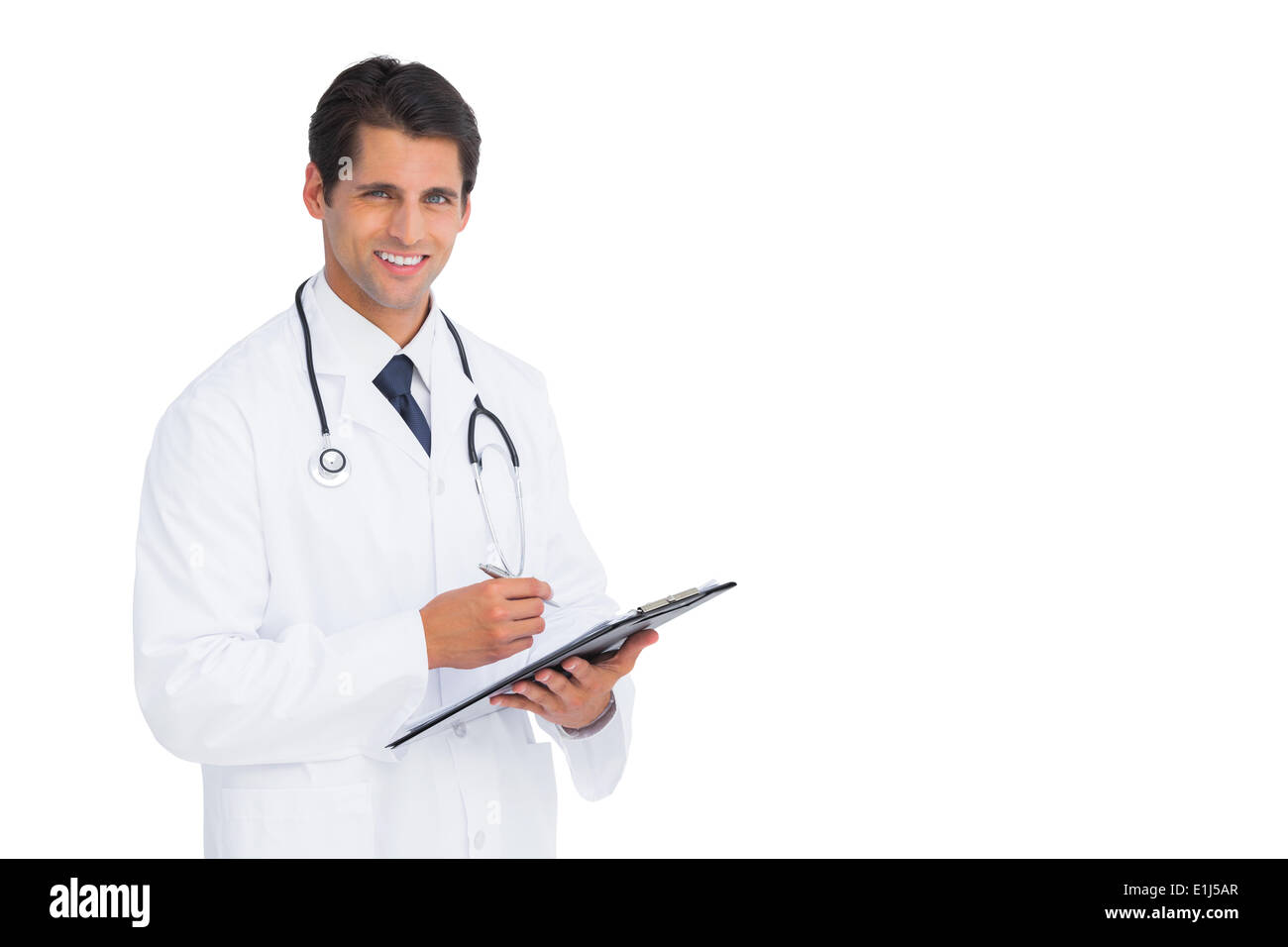 Handsome doctor holding clipboard hi-res stock photography and images ...