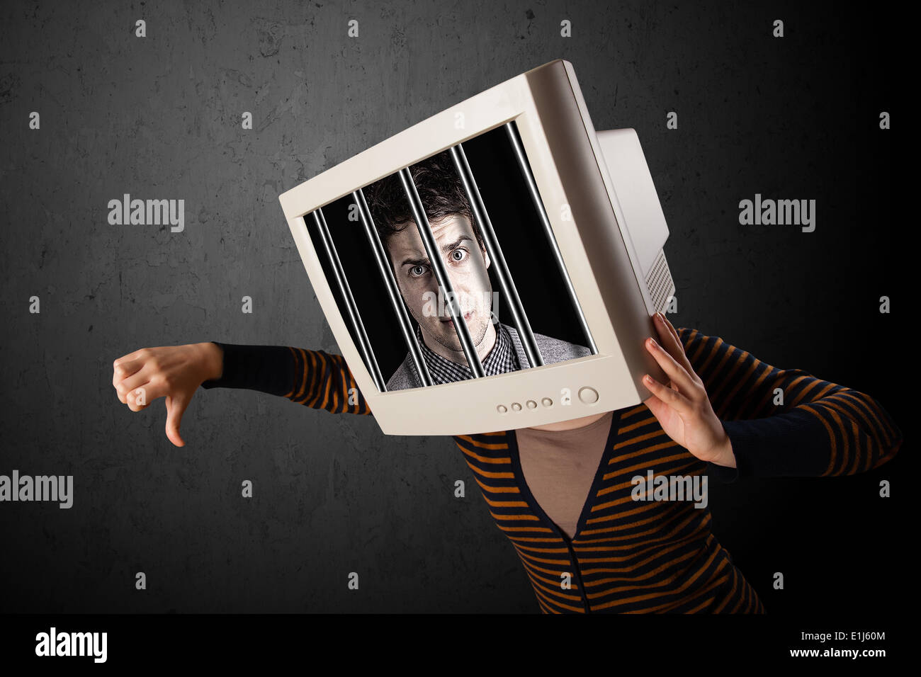 Business man with monitor on his head traped into a digital system ...