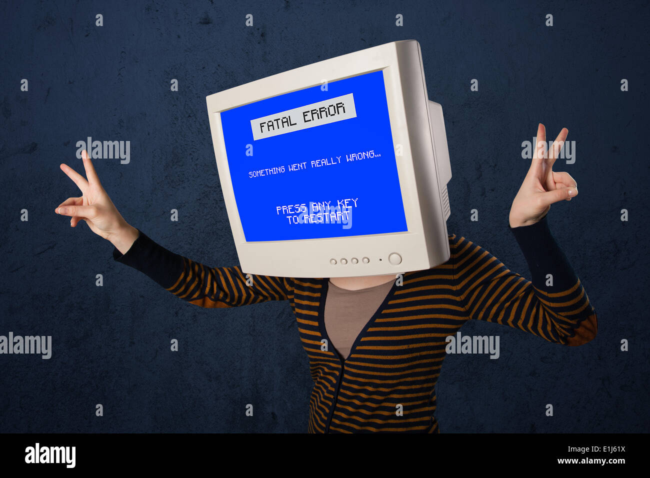 Person with a monitor head and fatal error blue screen on the display ...