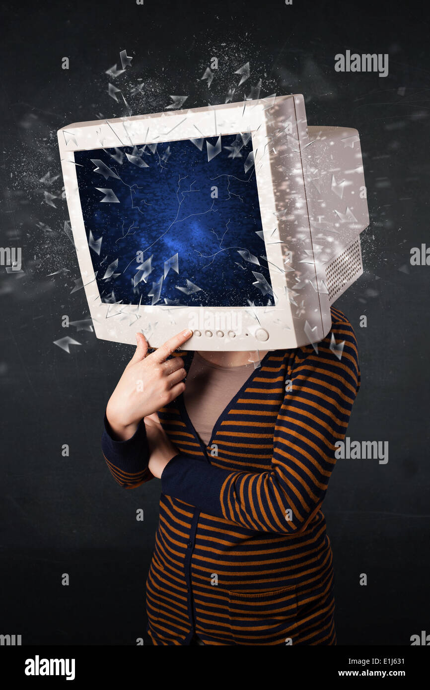 Computer monitor screen exploding on a young persons head Stock Photo ...