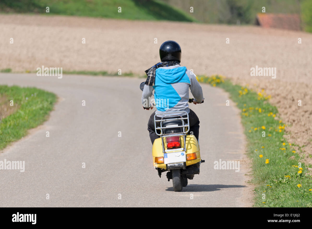 Man driving vespa hi-res stock photography and images - Alamy