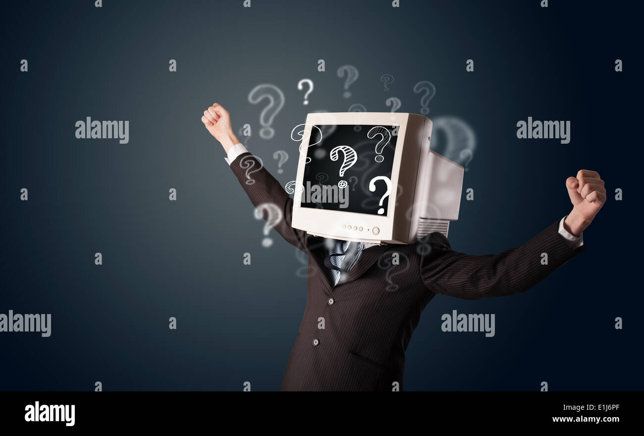Businessman with a computer monitor head and question marks Stock Photo ...