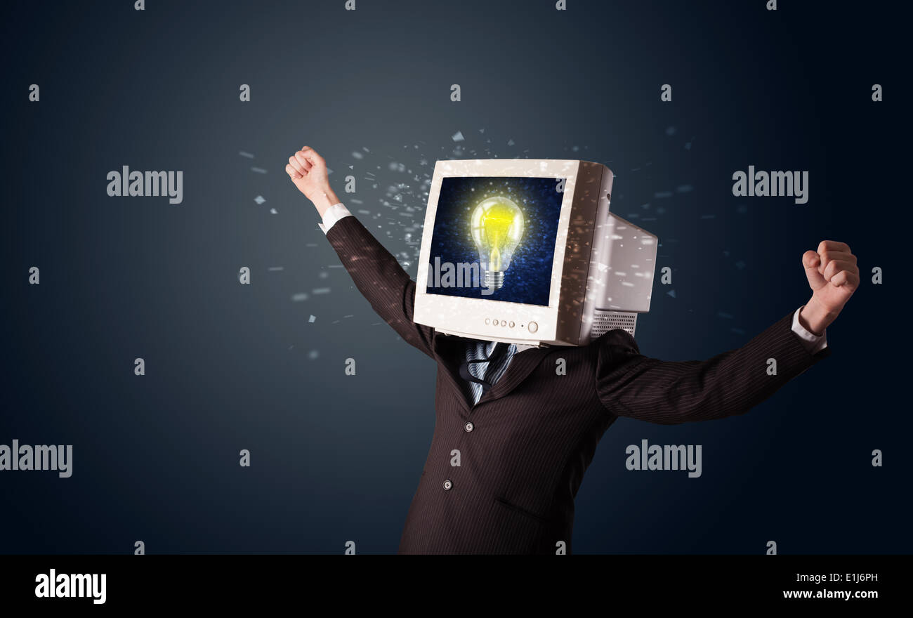 Business man with a pc monitor head and idea light bulb in the display ...