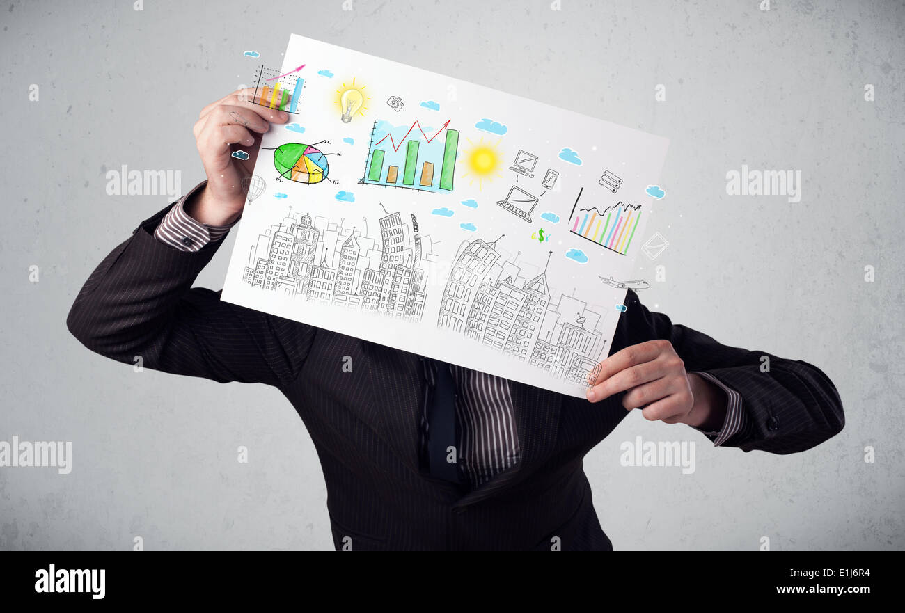 Businessman holding a paper with charts and cityscape in front of his ...