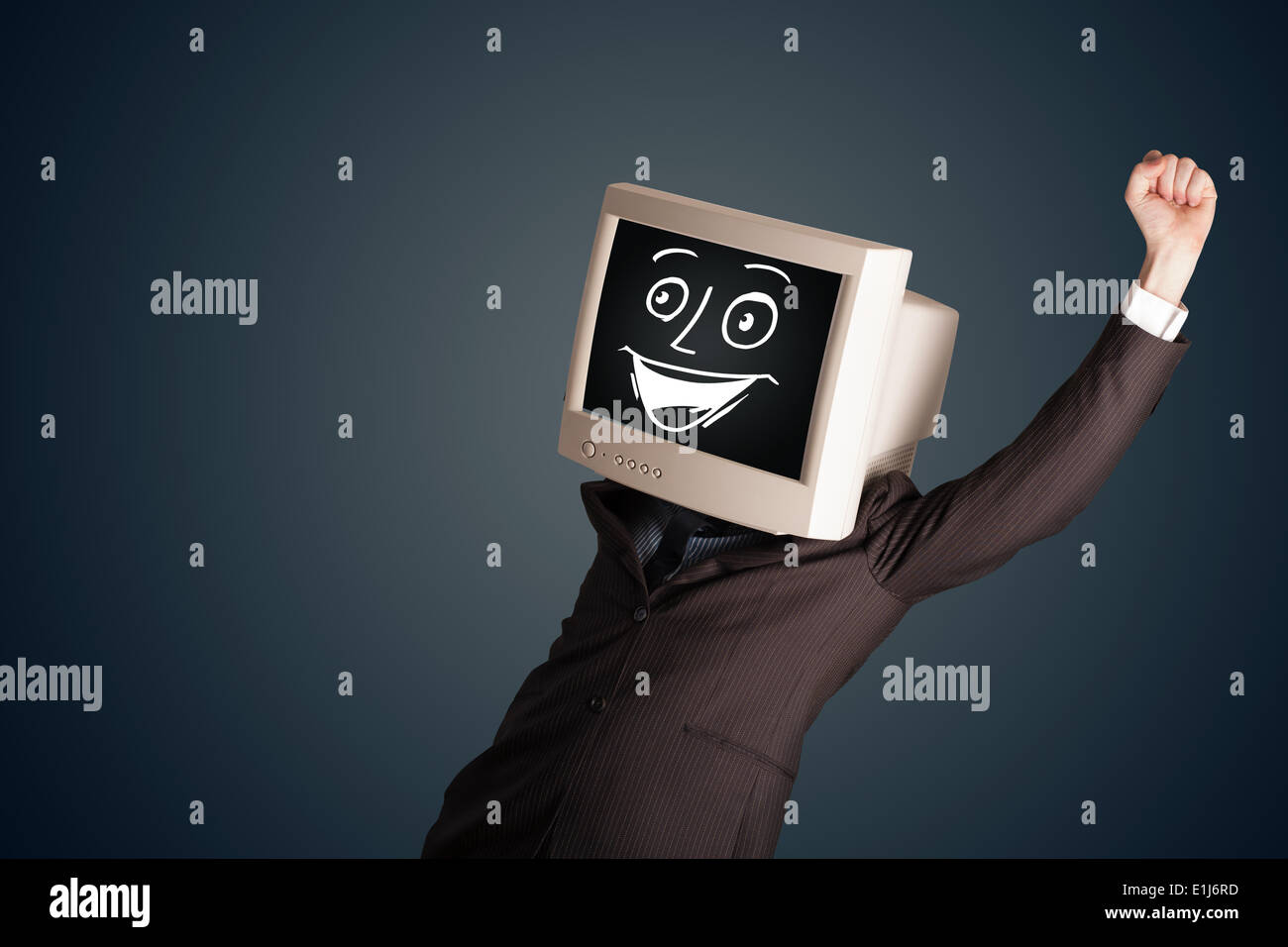 Happy businessman with a PC monitor head and a smiley face Stock Photo ...