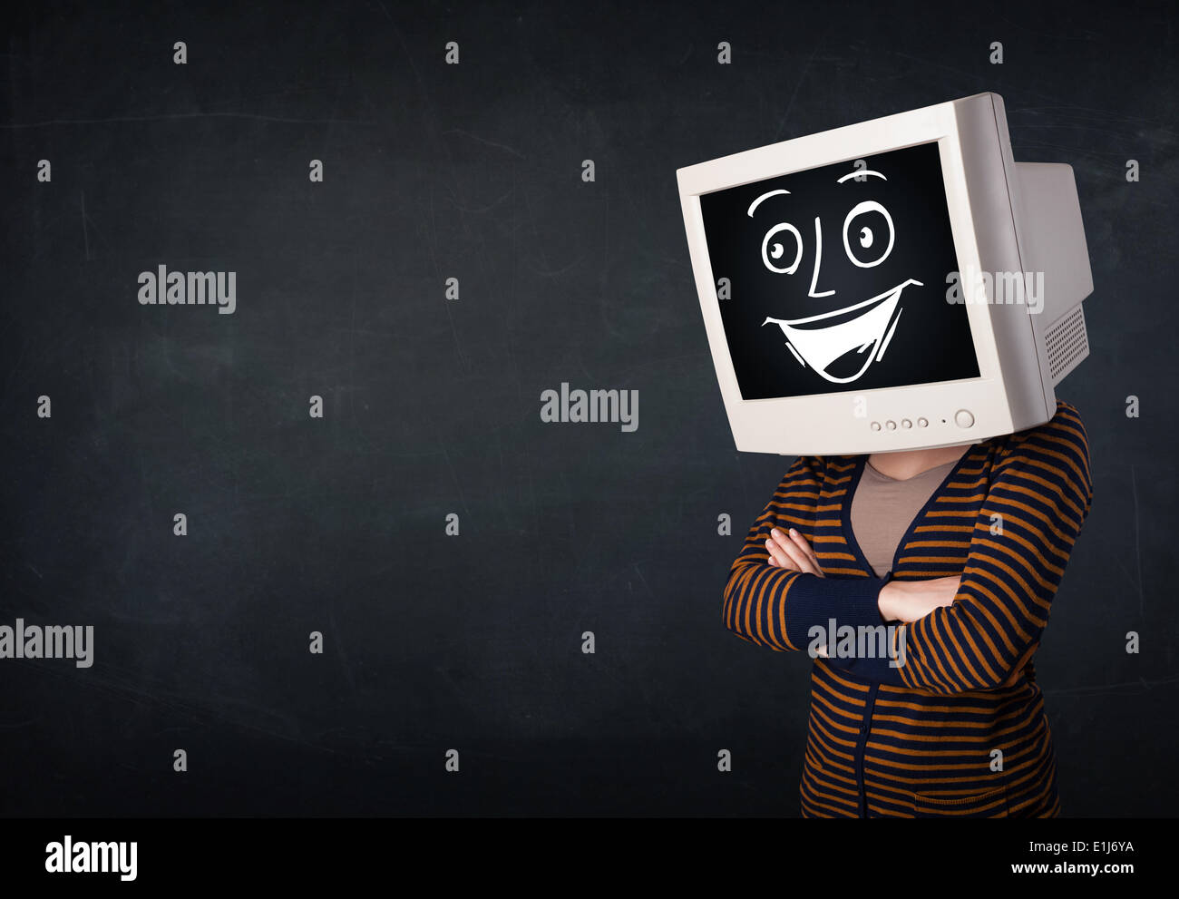 Girl with a monitor head and a cheerful cartoon face Stock Photo - Alamy