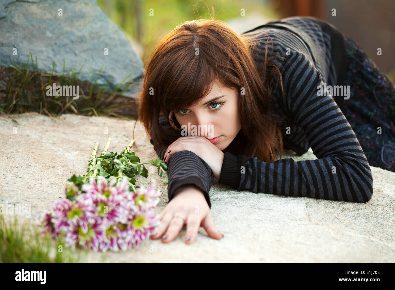 Young woman lying down dead hi-res stock photography and images - Alamy