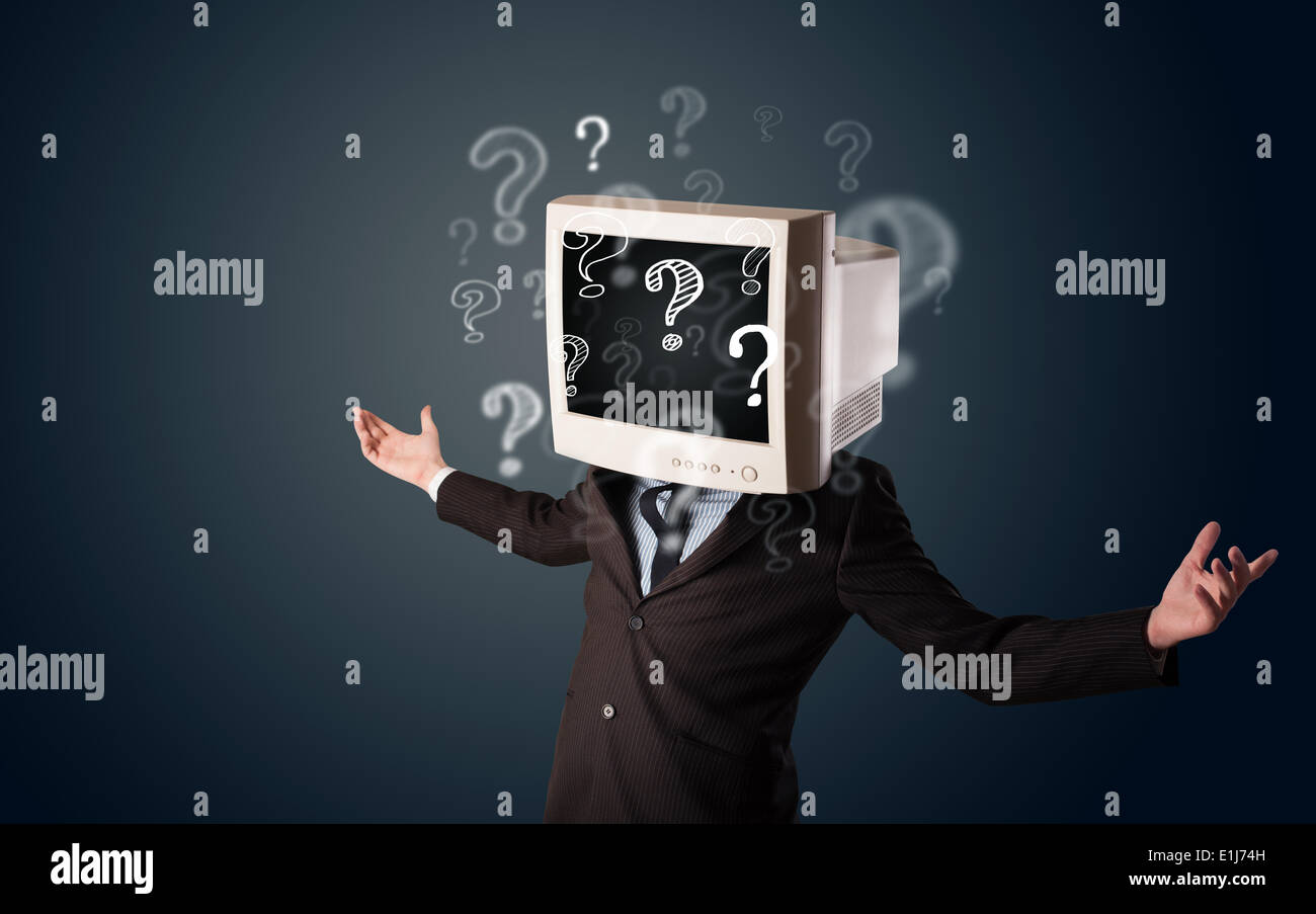 Businessman with a computer monitor head and question marks Stock Photo ...