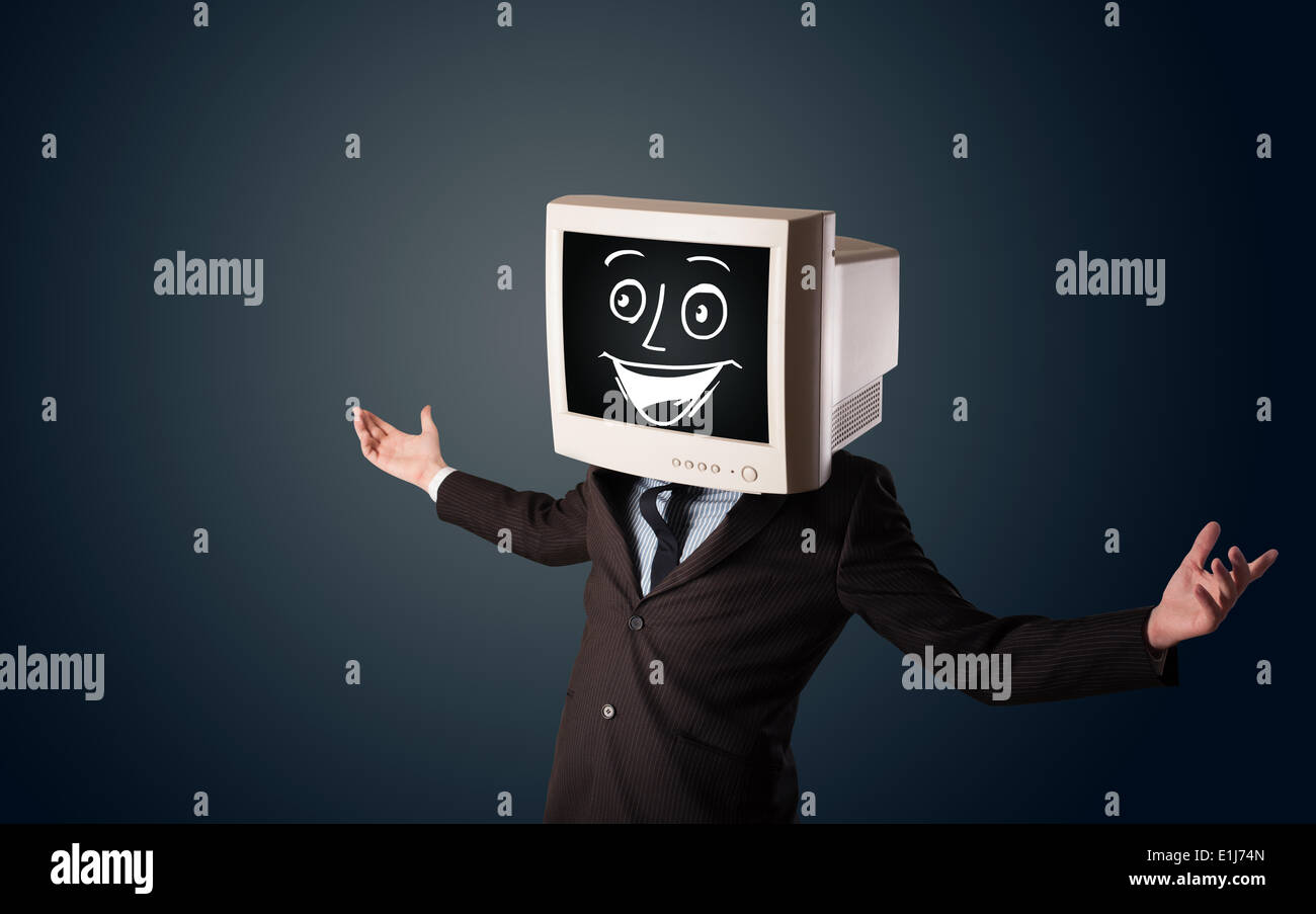 Happy businessman with a PC monitor head and a smiley face Stock Photo ...