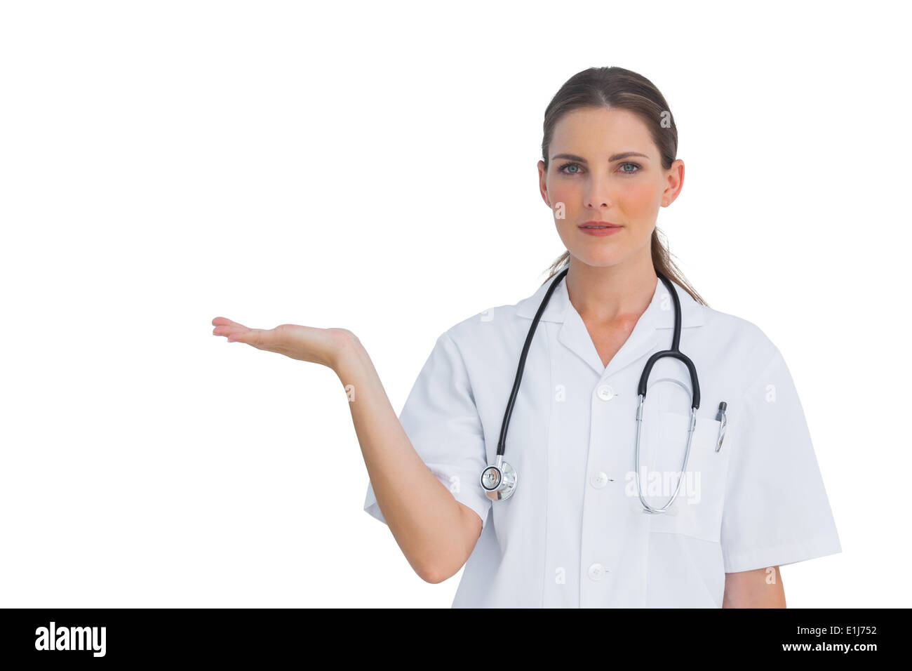 Serious nurse showing something Stock Photo - Alamy