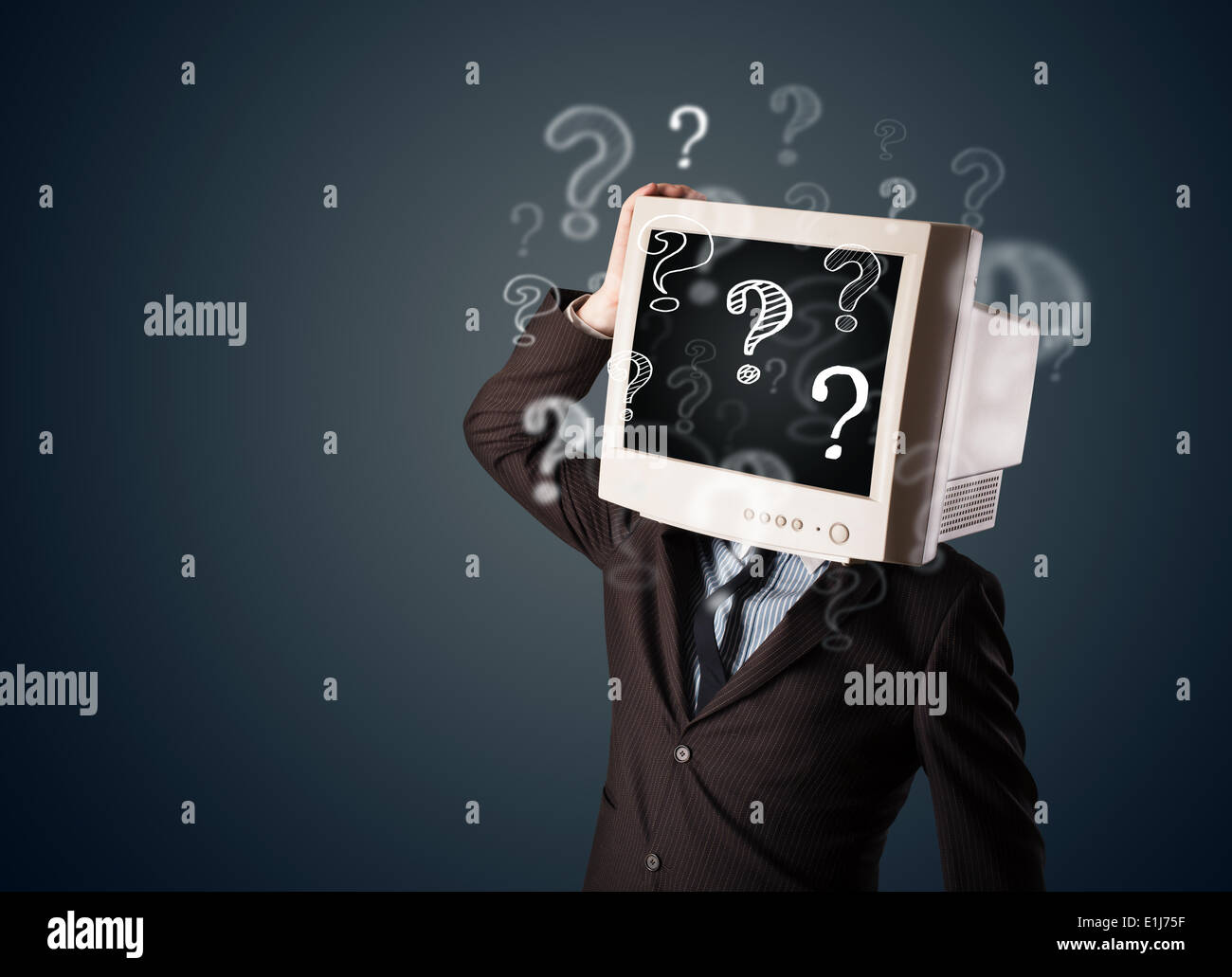 Businessman with a computer monitor head and question marks Stock Photo ...