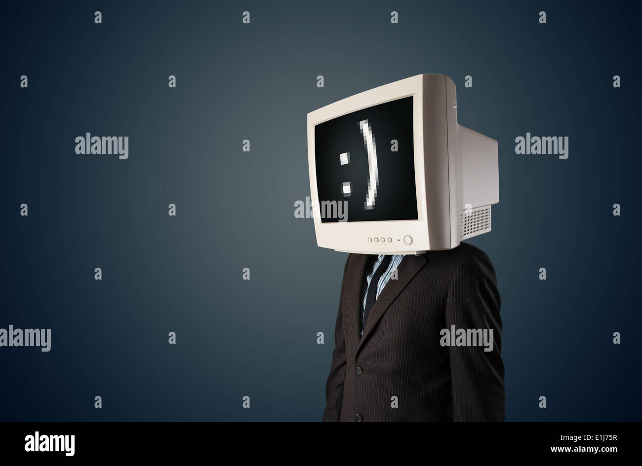 Funny young businessman with a monitor on his head and smiley on the ...