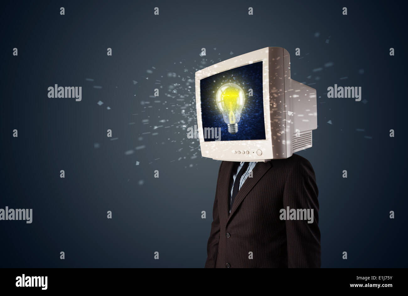 Business man with a pc monitor head and idea light bulb in the display ...