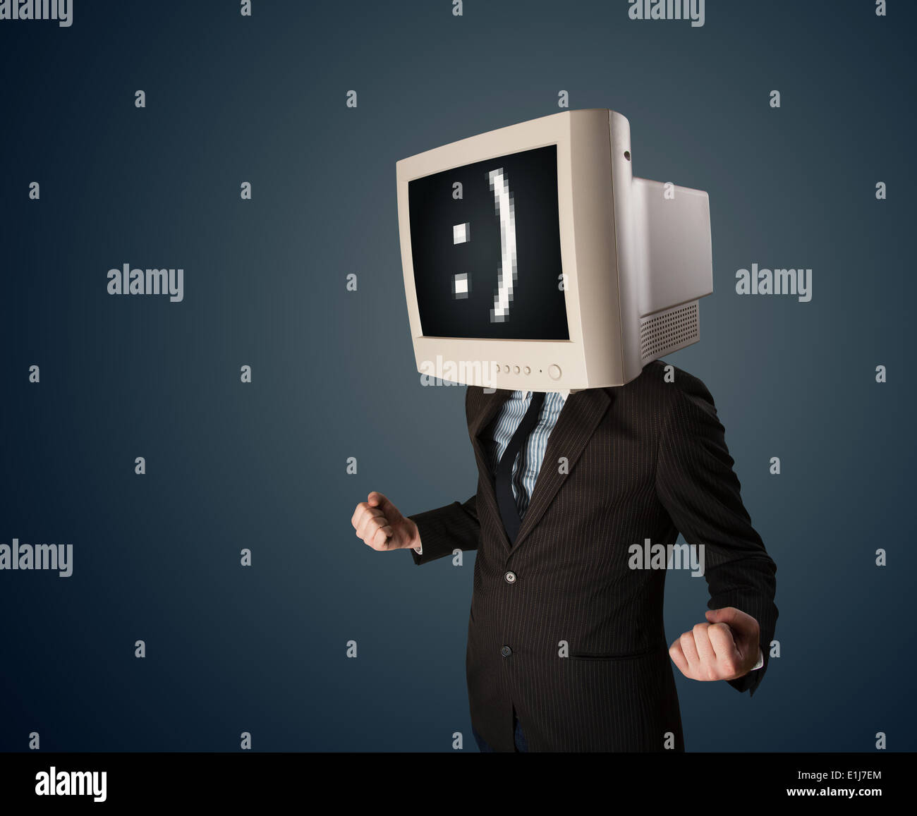 Funny young businessman with a monitor on his head and smiley on the ...